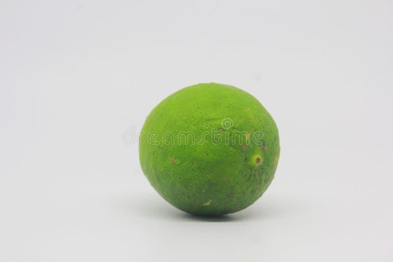 Green Lime Isolated stock photo. Image of organic, fresh - 136910600
