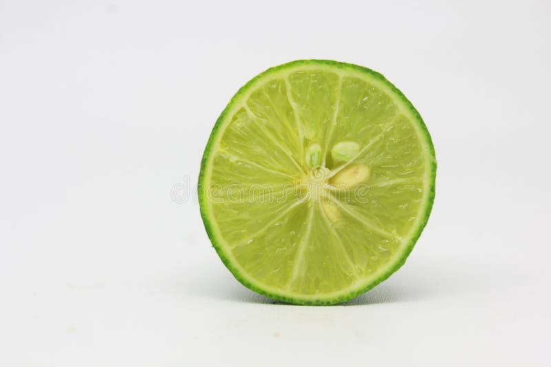 Green Lime Isolated stock image. Image of citrus, organic - 136911137