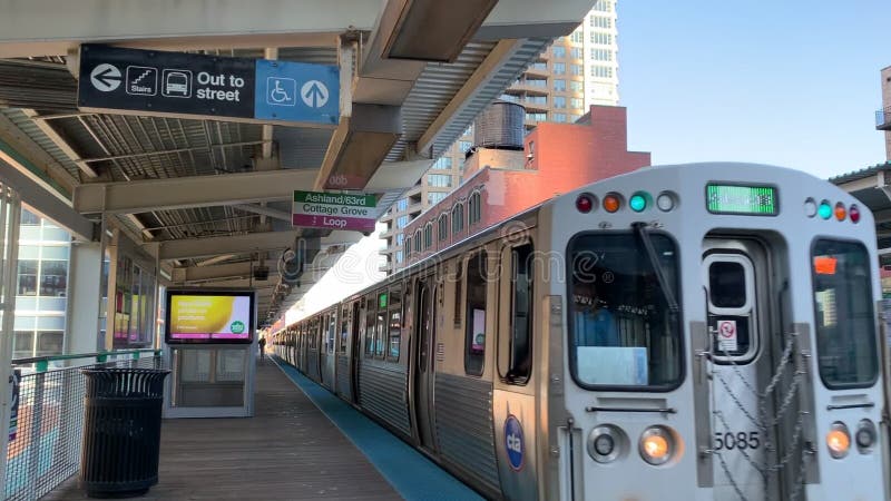 Green Line CTA Train Approaching on the Tracks at the Clinton Station ...