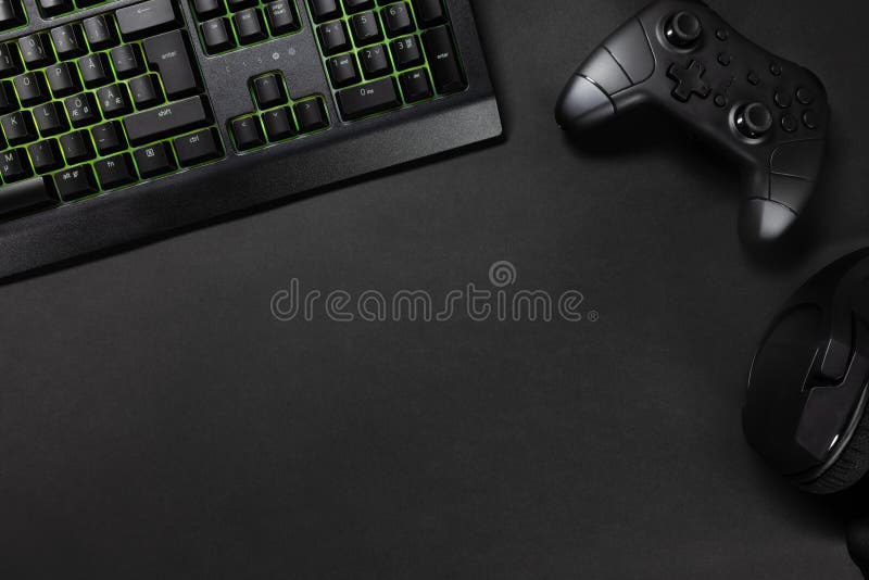Green Lit Keyboard by Game Controller and Mouse Stock Image - Image of ...