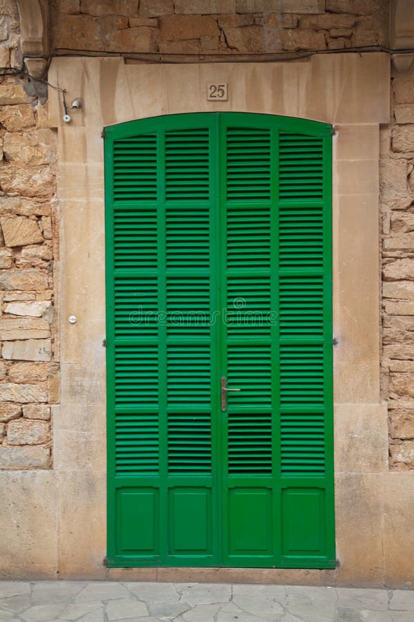 Green Louvered Door stock image. Image of green, twenty - 17559187