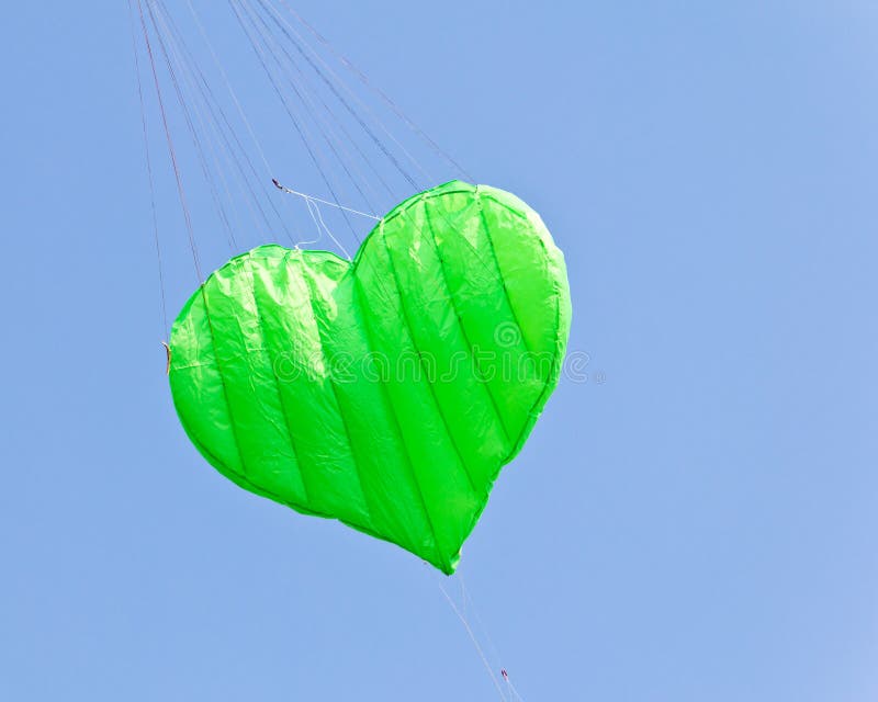 Green love heart kite stock image. Image of blue, recreational - 18153283