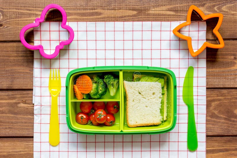 Green Lunch Box for Kid on Wooden Background Top View Stock Image ...