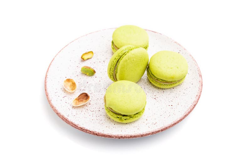 Green Macarons or Macaroons Cakes Isolated on White Background. Side ...