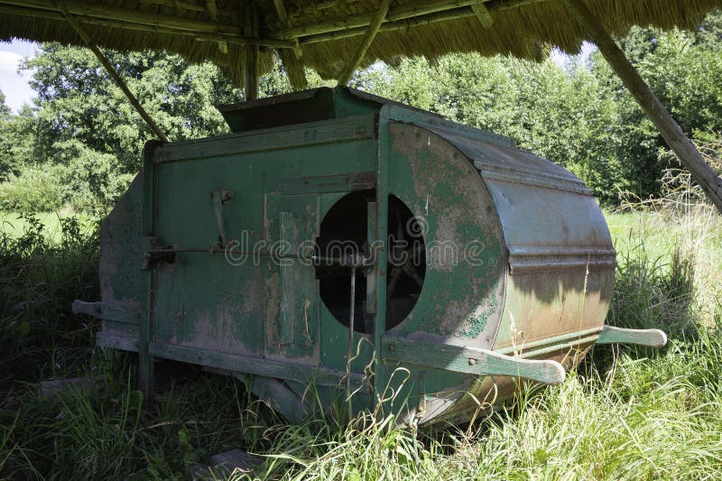 A Green Machine with a Hole in the Front Stock Image - Image of sitting ...