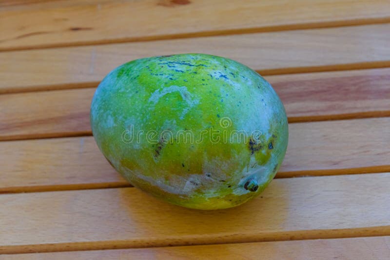 Green Mango Fruit on a Wooden Table Stock Photo - Image of lifestyle ...