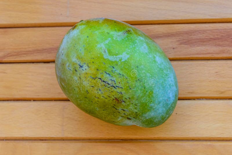 Green Mango Fruit on a Wooden Table. Top View Stock Image - Image of ...