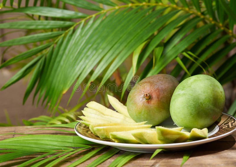 Green mango slices outdoor stock photo. Image of exotic - 137163872