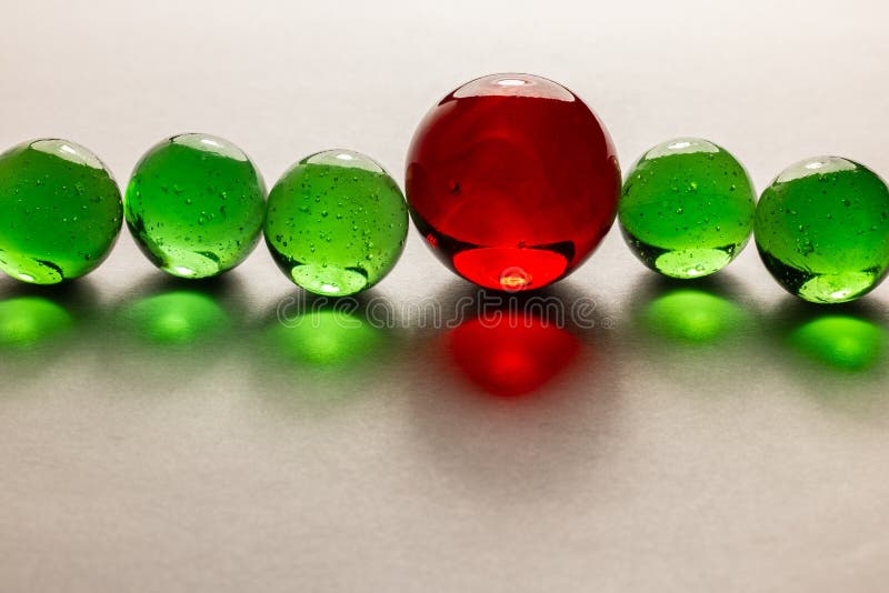 Green Marbles with One Red Marble in a Row Stock Image - Image of ...