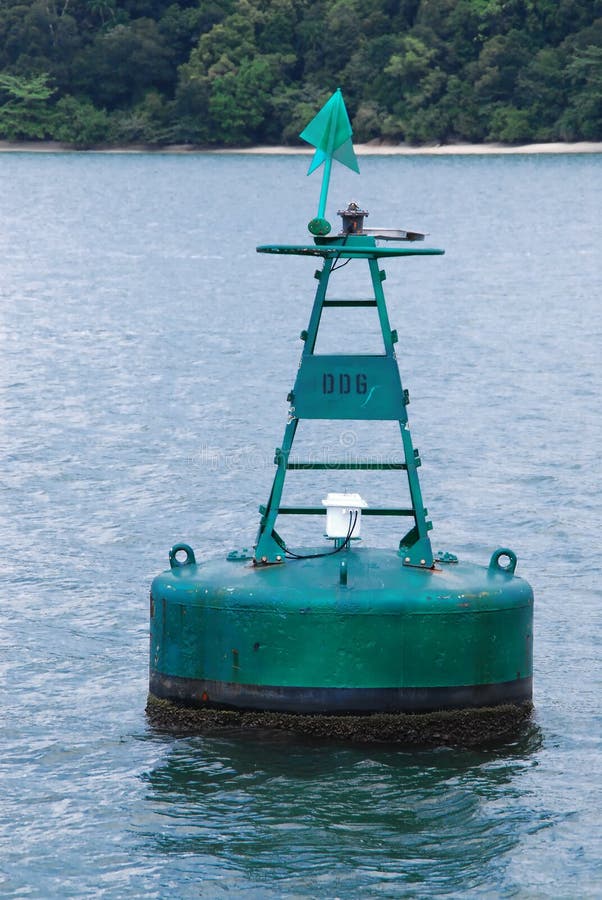 Green Solar Powered Light Buoy Stock Photo - Image of beach, channel ...