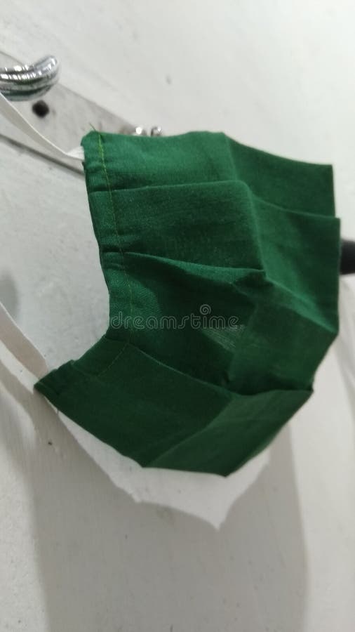 A Green Mask, for Covid-19 Prevention Stock Photo - Image of sick ...