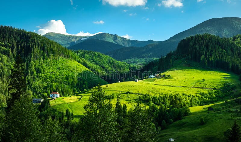 Green Meadows and Mountains Stock Image - Image of idyllic, blue: 134400743