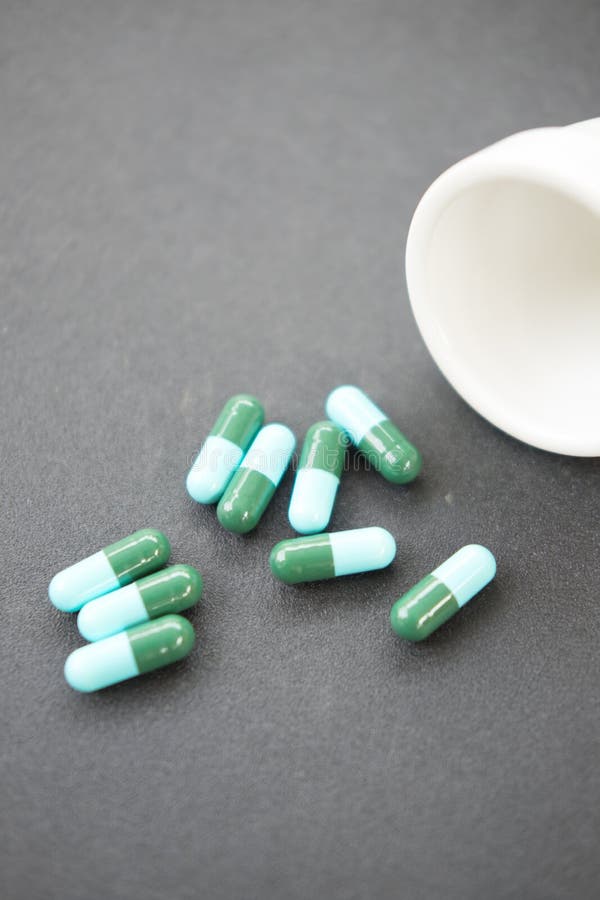 Green medical capsules stock photo. Image of manufacture - 72039752
