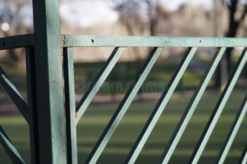 Green metal fence stock image. Image of barrier, entrance - 110688837