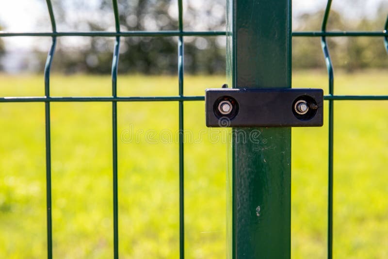 Green Metal Fence and Post. Sunny Day Stock Image - Image of metallic ...