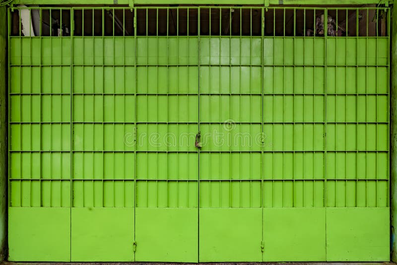 Green Metal Folding Gate stock photo. Image of entry - 78849102