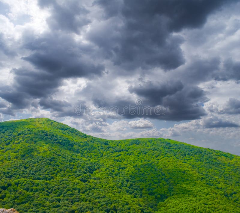 Mountain Chain Under a Dense Cloudy Sky Stock Image - Image of ...