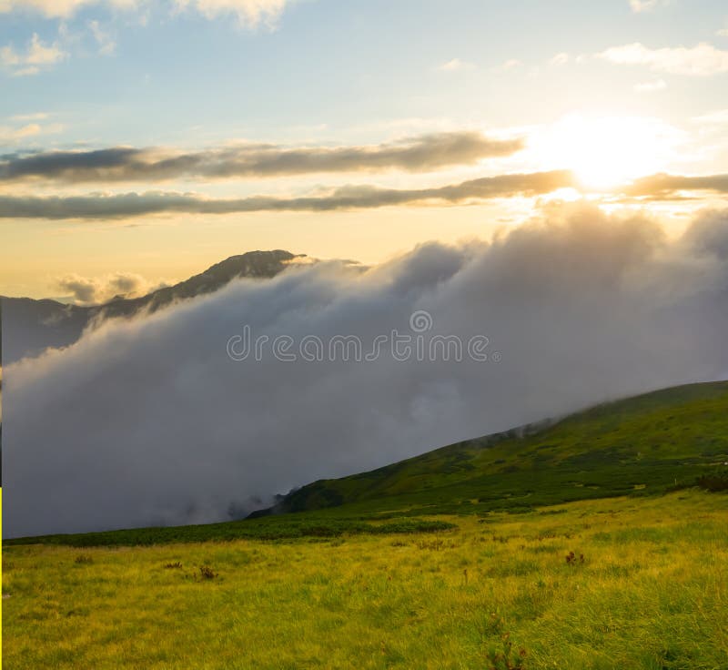 Mountain Plateau in Dense Clouds at the Sunset Stock Photo - Image of ...