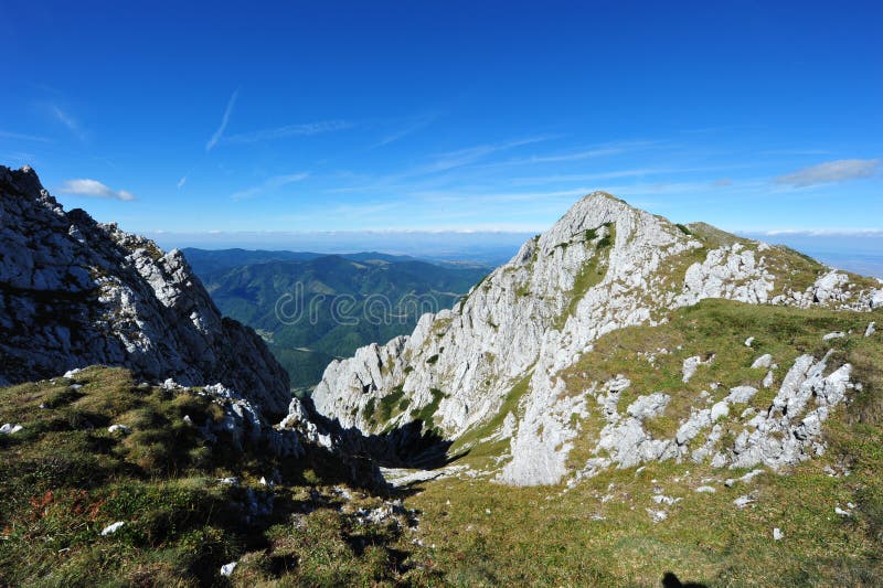 Green Mountain Valley and Steep Rocky Cliffs Stock Photo - Image of ...