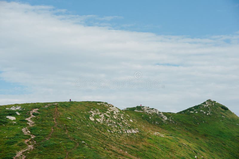 A Green Mountain Ridge and Sky Stock Photo - Image of ecology, hikers ...