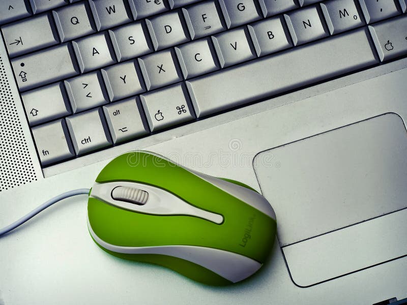 Green Mouse On Silver Laptop Picture. Image: 83063200