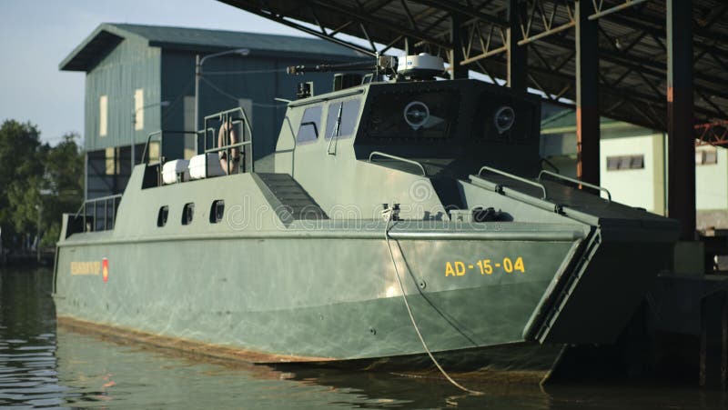 Green Navy Speed Boat Docked at a Docking Station Editorial Photo ...