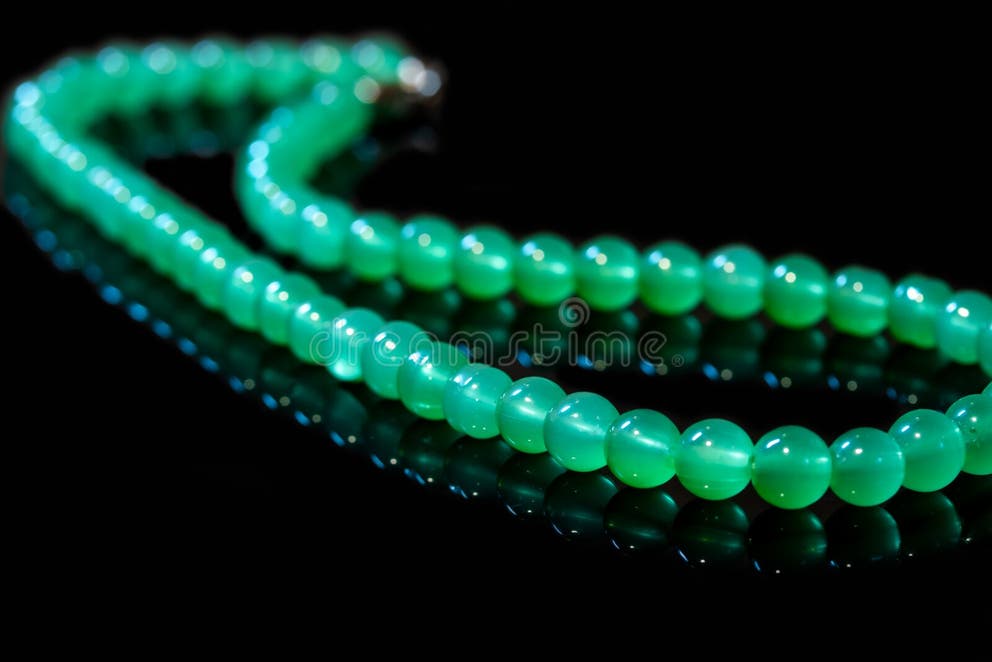 Green Nephritis Beads on Black Background Stock Image - Image of choker ...
