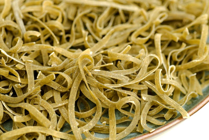 Green noodles, close-up stock photo. Image of flour - 246910614