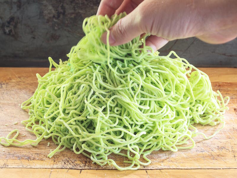 Green noodles stock image. Image of hand, healthy, noodles - 40598893