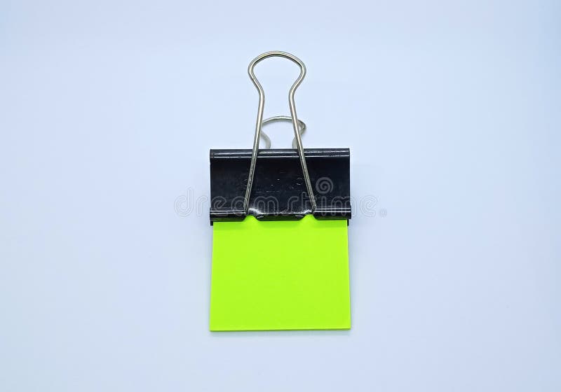 Green Note Paper with Black Binder Clip. Binder Clip and Stack of Green ...