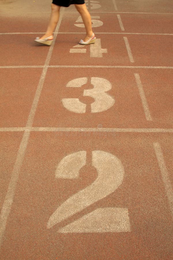 Green Number on Plastic Runway in a Sports Ground Stock Image - Image ...