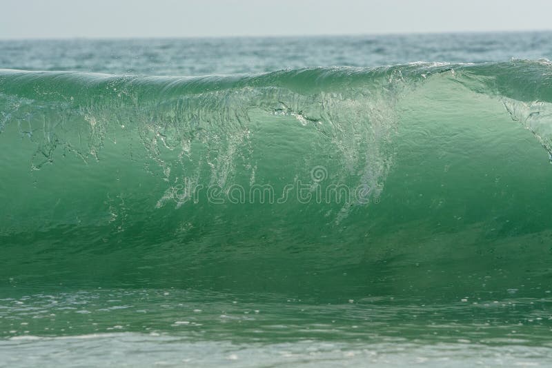 Surf with green wave stock image. Image of sand, equator - 60344839