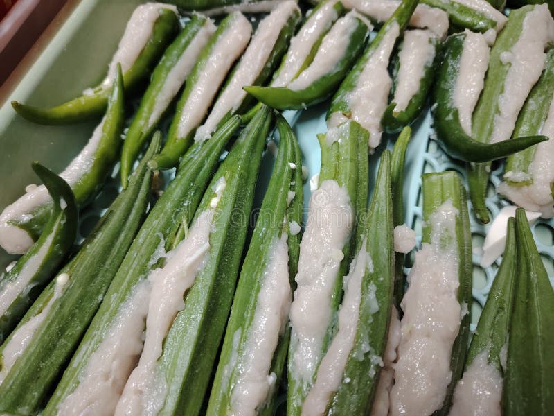 Green Okra Pods are Split Open and Stuffed with Fish Paste Stock Photo ...