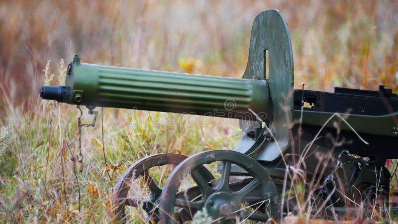A Green Old Machine Gun Standing on the Field Stock Image - Image of ...