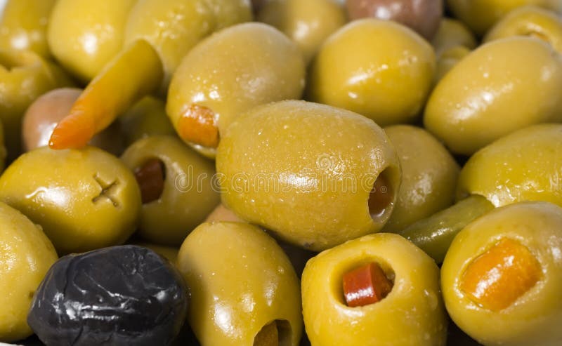 Green olives stuffed stock image. Image of delicious - 34003643