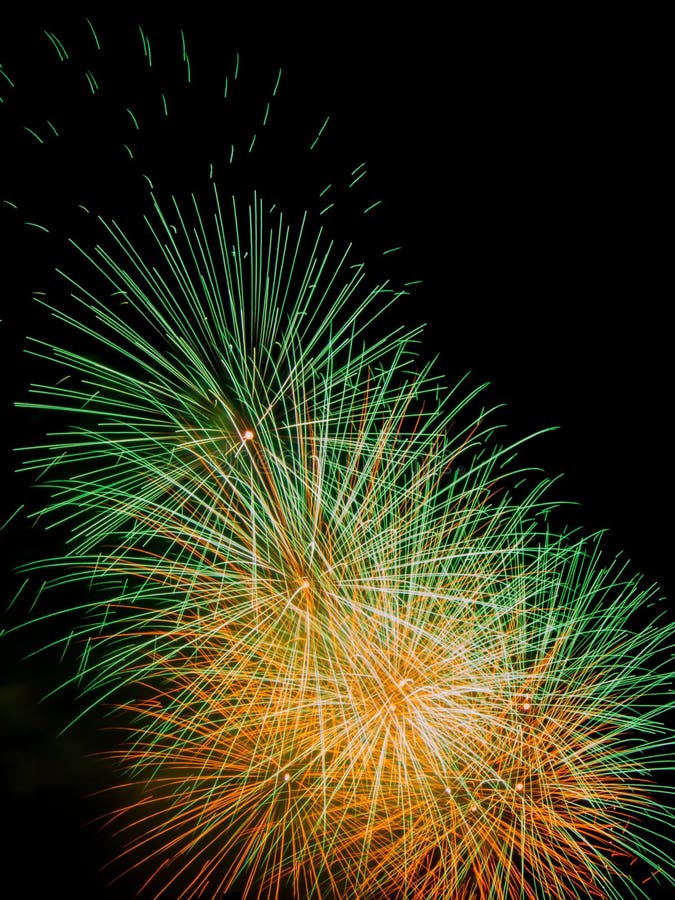 Green and Orange Fireworks Close-up Stock Image - Image of close ...