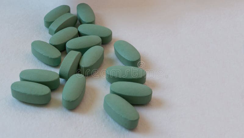 Green Oval Tablet Pills Isolated on White Background, Oval Vitamin ...