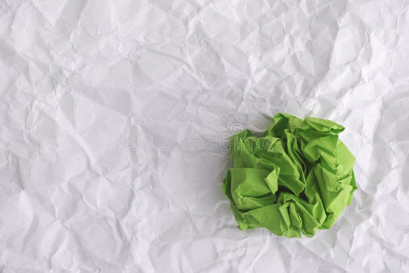 Green Paper Ball on Crumpled Paper Background Stock Photo - Image of ...