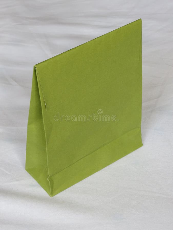 A green paper packet stock photo. Image of cosmetics - 196053138