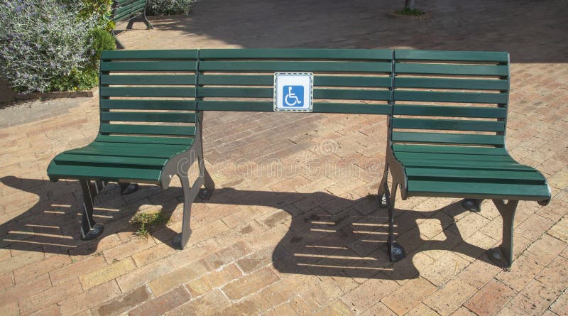 Green Park Bench with Wheelchair Space Stock Photo - Image of disabled ...