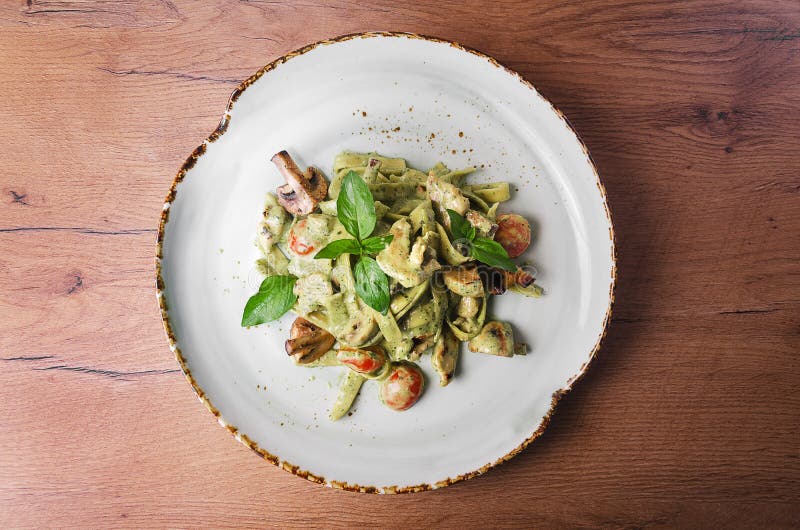 Green Pasta with Chicken, Basil and Mushrooms Stock Image - Image of ...