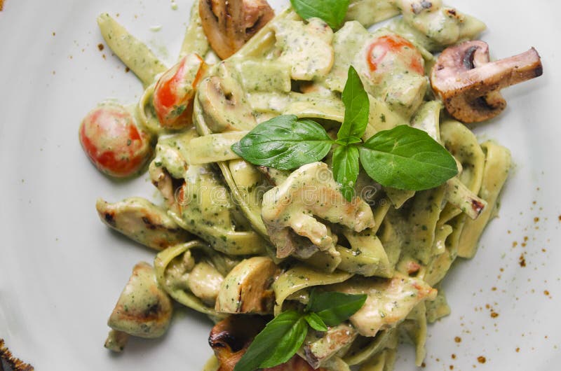 Green Pasta with Chicken, Basil and Mushrooms Stock Image - Image of ...