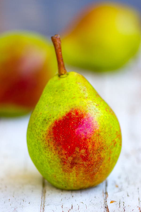 Green pear with red side stock image. Image of delicious - 58169011