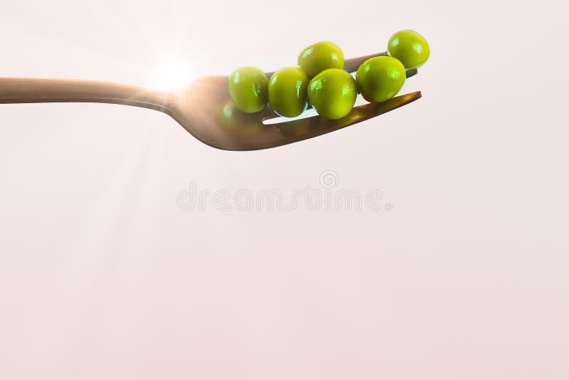 Peas on the fork stock photo. Image of food, sacrifice - 25073546