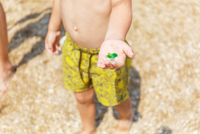 Child Collect Pebbles Stock Photos - Free & Royalty-Free Stock Photos ...