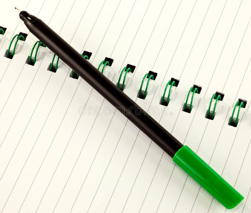 Green pen and notepad stock image. Image of green, closeup - 38542115