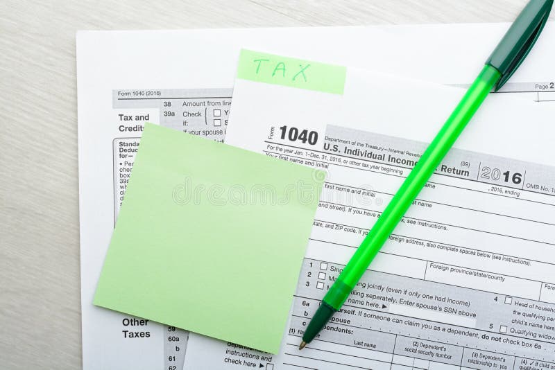 Green Pen and Sticker on Tax Form Editorial Photography - Image of ...