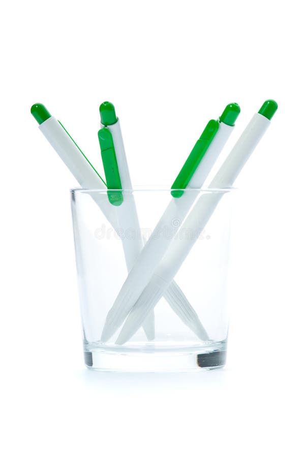 Green pens in a glass stock photo. Image of pencil, path - 11155632