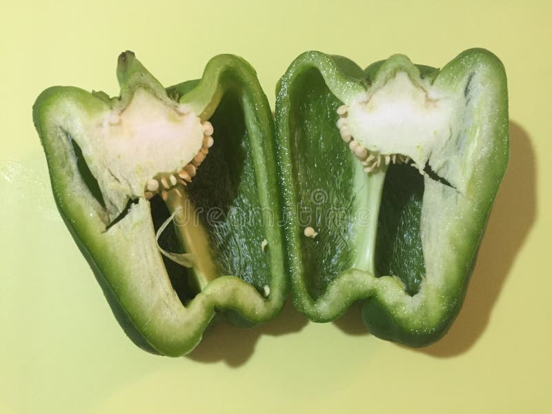 Green pepper cut in half stock photo. Image of pepper - 60829036