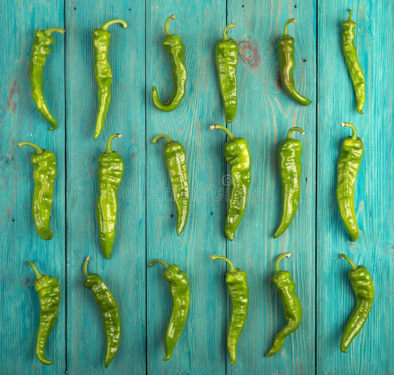 Green Pepperoni Peppers on the Wooden Table Stock Photo - Image of ...